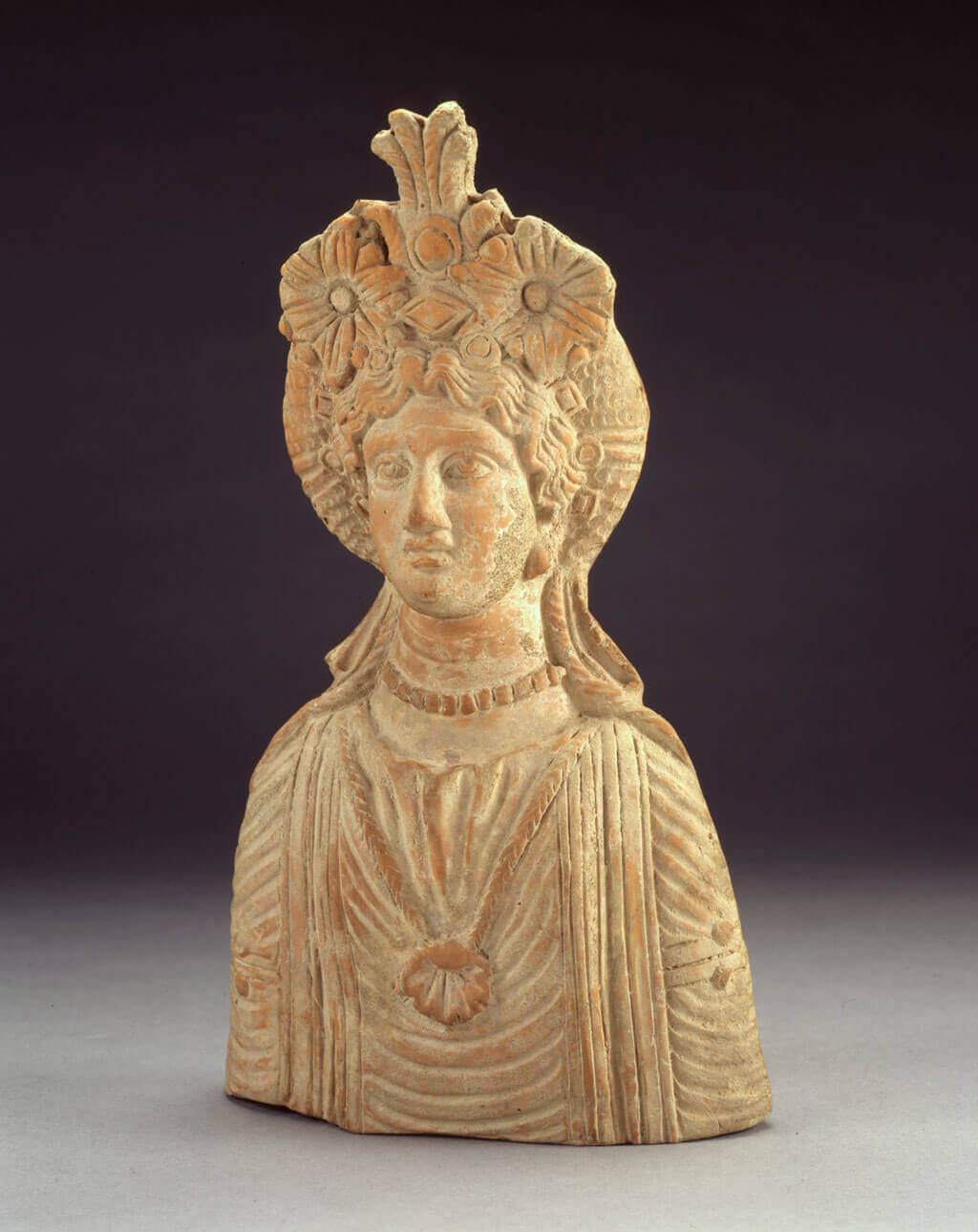 Priestess of Aphrodite? Shell / crescent motif on sculptures. Isis ...