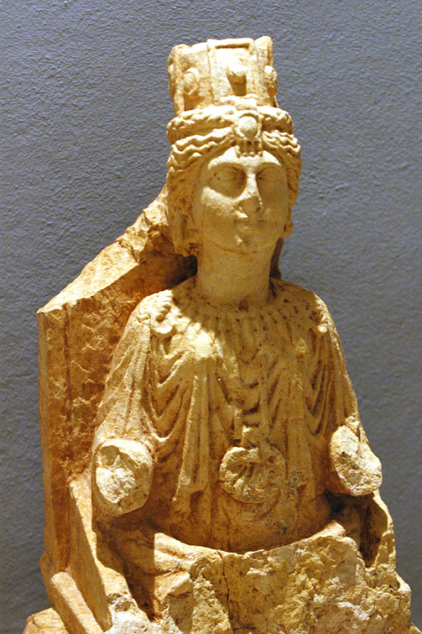 Priestess of Aphrodite? Shell / crescent motif on sculptures. Isis ...
